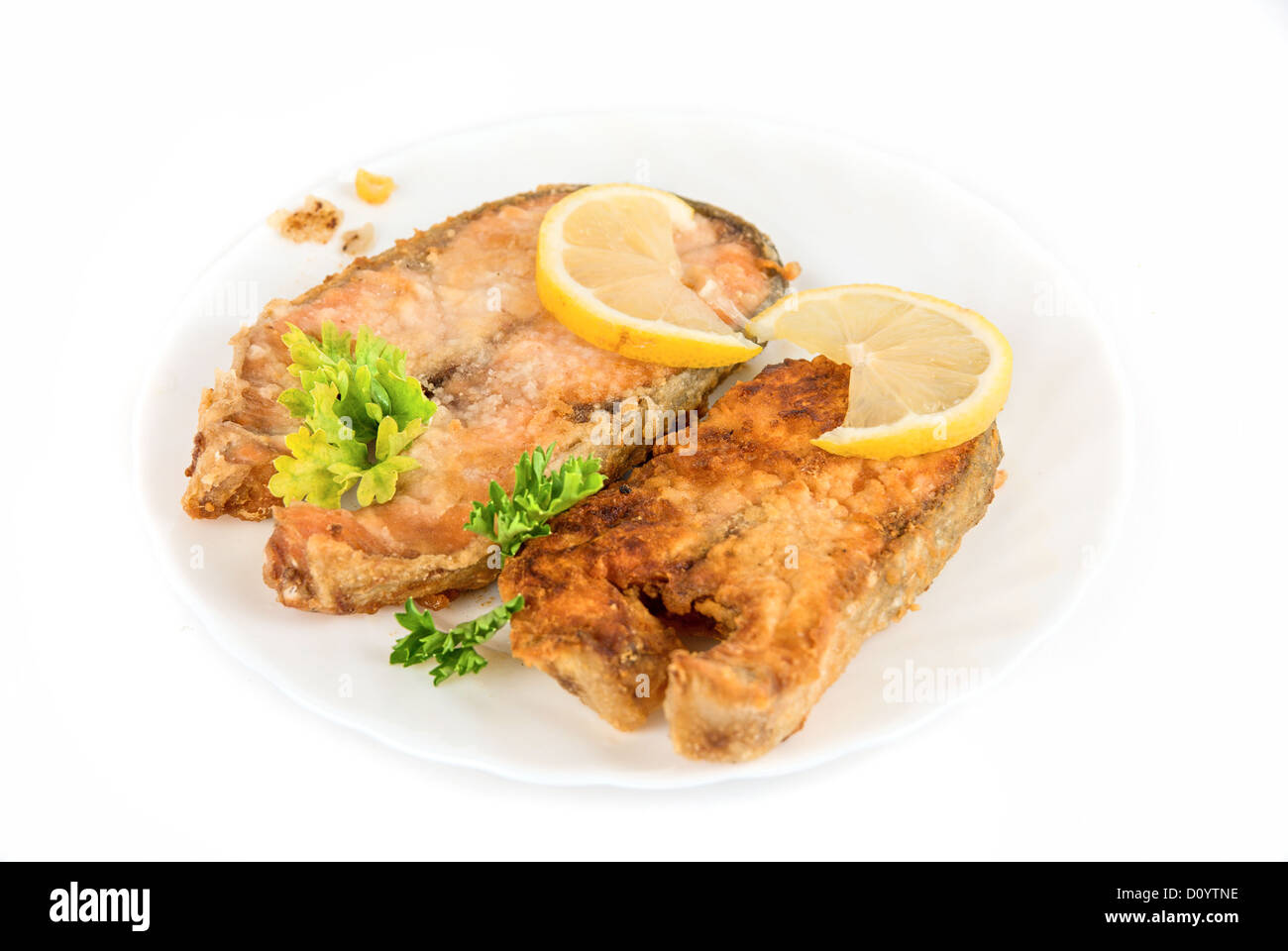 Woman and fish cooking Cut Out Stock Images & Pictures - Alamy