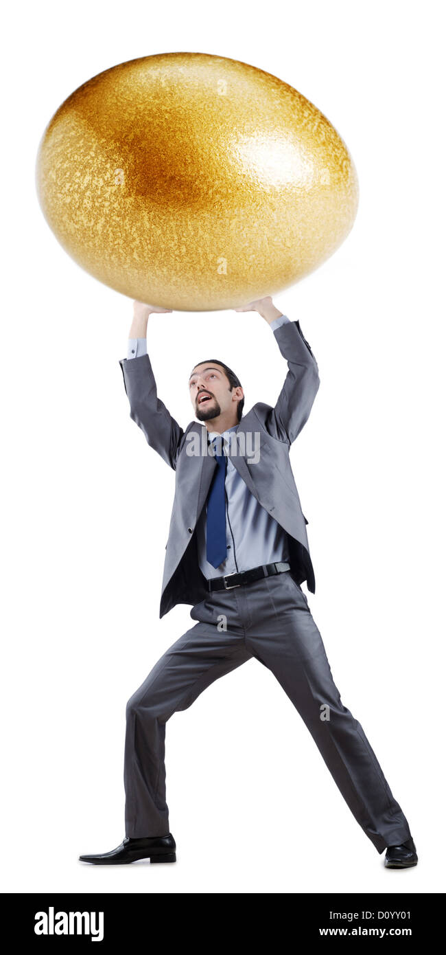 Man and golden egg isolated on white Stock Photo - Alamy