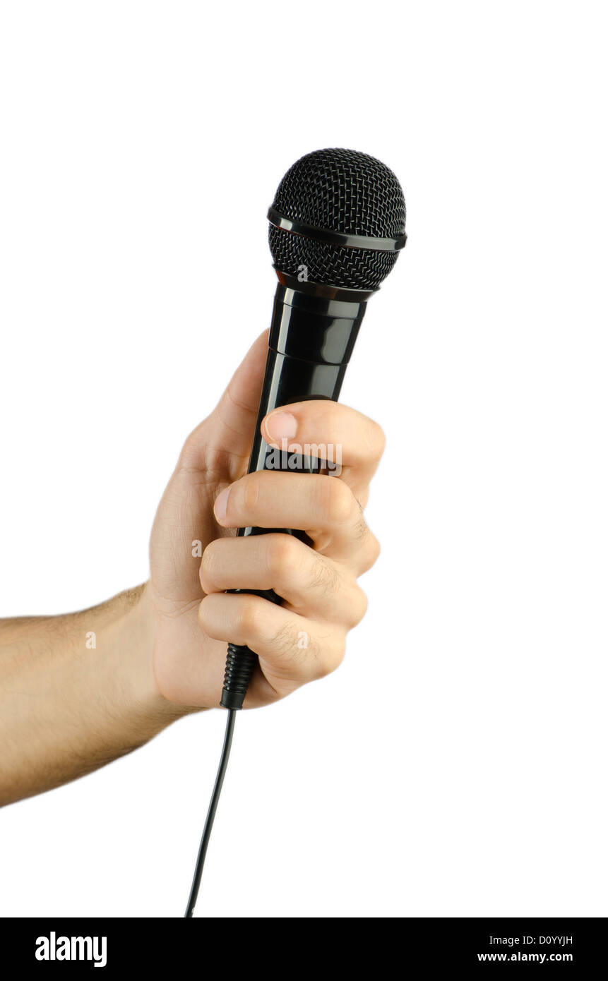Hand holding microphone on white Stock Photo - Alamy