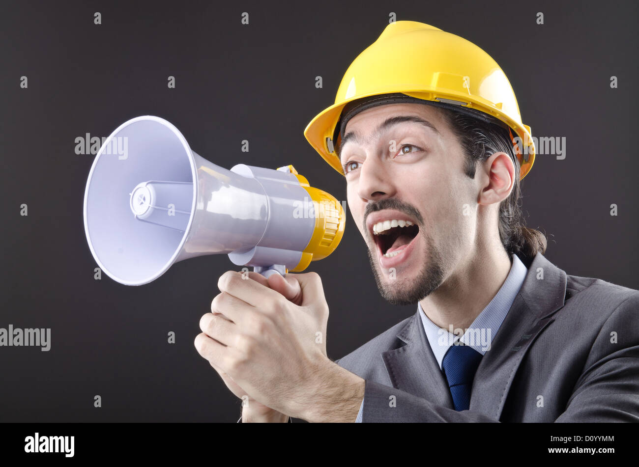 Man shouting and yelling with loudspeaker Stock Photo - Alamy