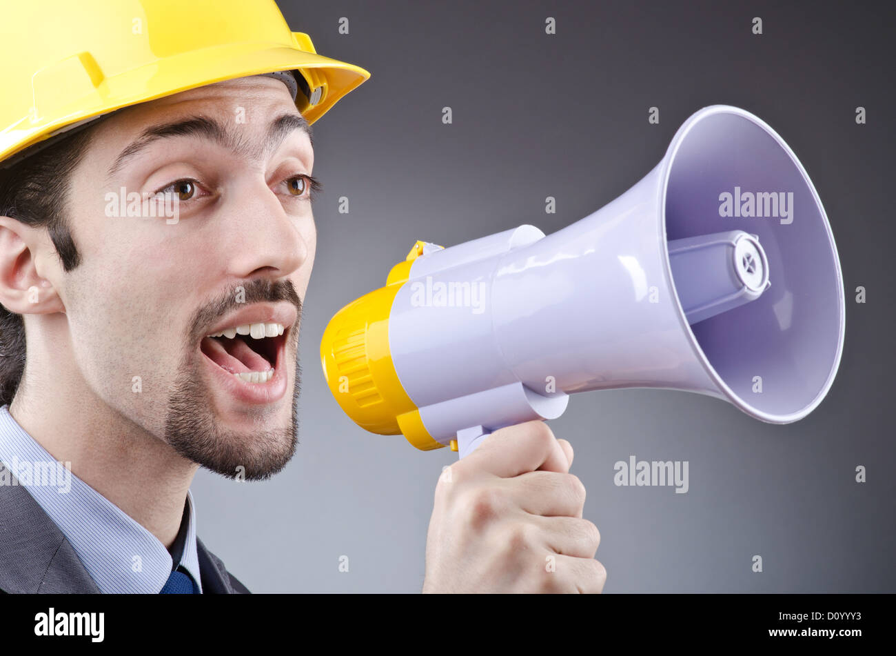 Man shouting and yelling with loudspeaker Stock Photo - Alamy