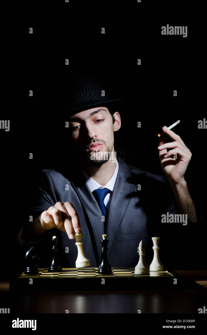 Chess player playing his game Stock Photo - Alamy