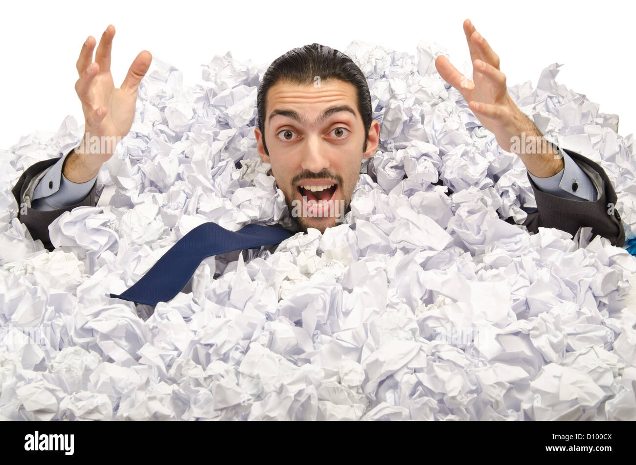 Man with lots of crumpled paper Stock Photo - Alamy