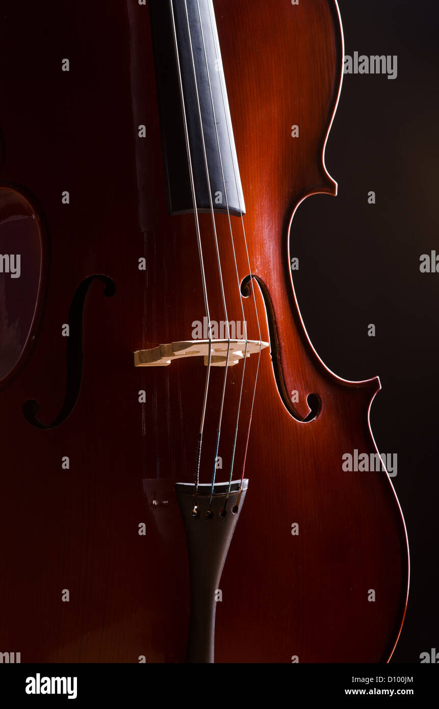 Music Cello in the dark room Stock Photo - Alamy