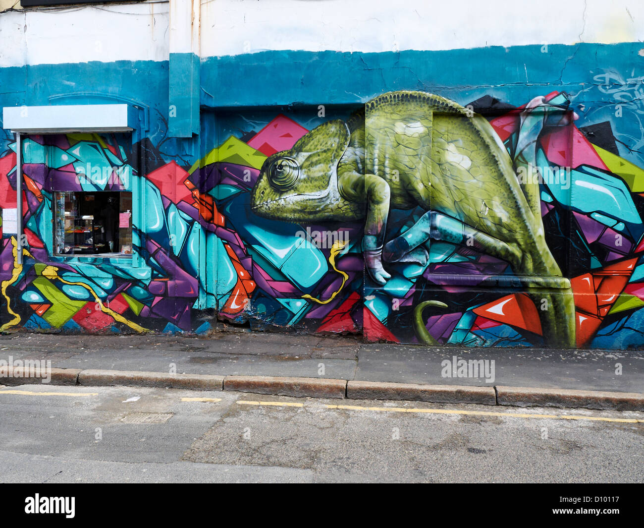 Hole in the wall shop with colorful graffiti in Liverpool UK Stock ...