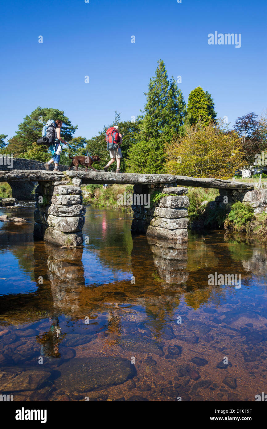 England, Devon, Dartmoor, Postbridge, Hikers Crossing The Clapper ...