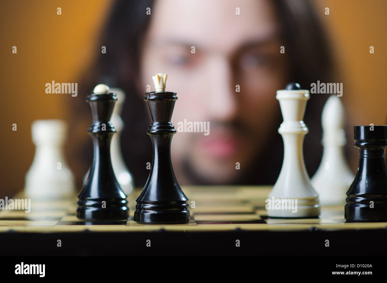 Chess player playing his game Stock Photo - Alamy