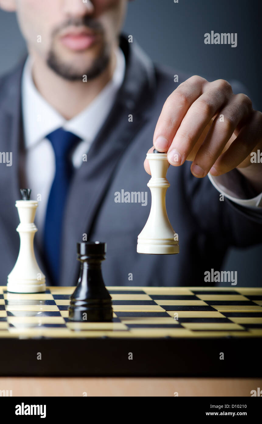 Chess player playing his game Stock Photo - Alamy