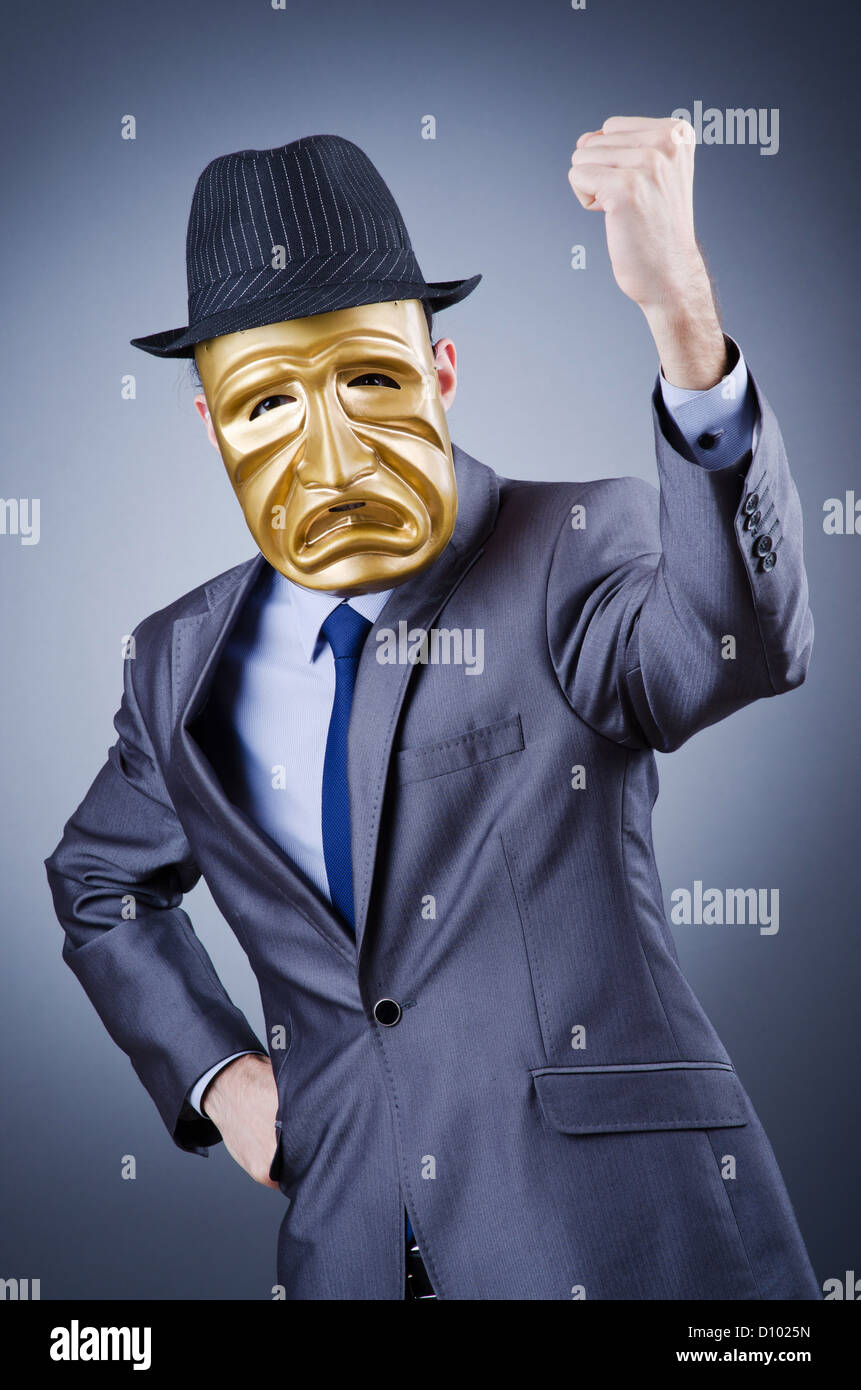Businessman with mask concealing his identity Stock Photo - Alamy