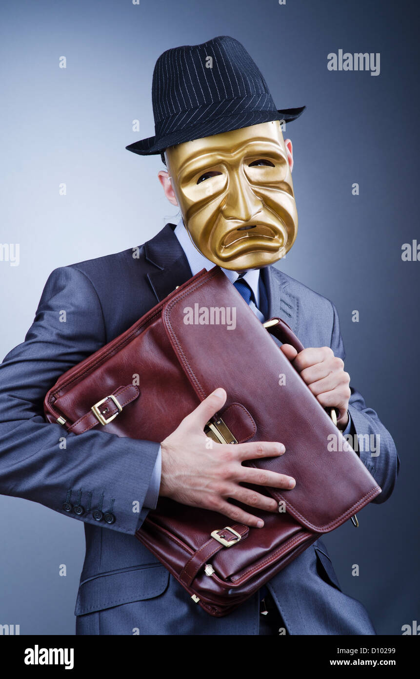 Businessman with mask concealing his identity Stock Photo - Alamy