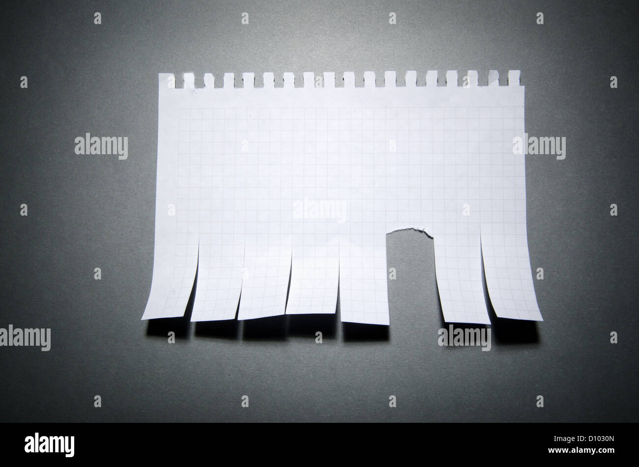 Tear off paper notice on the wall Stock Photo - Alamy