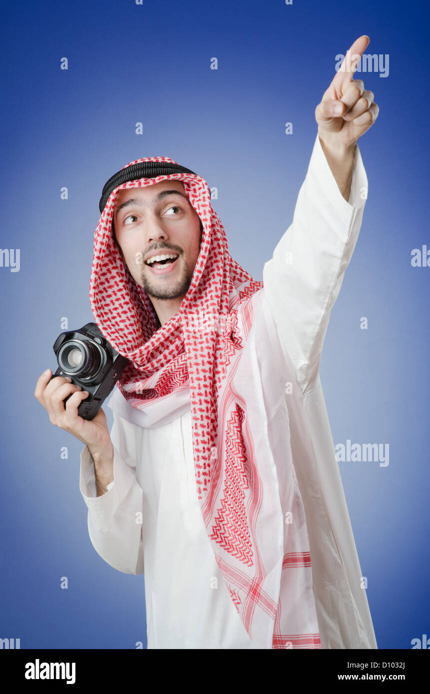 Arab photographer in studio shooting Stock Photo - Alamy