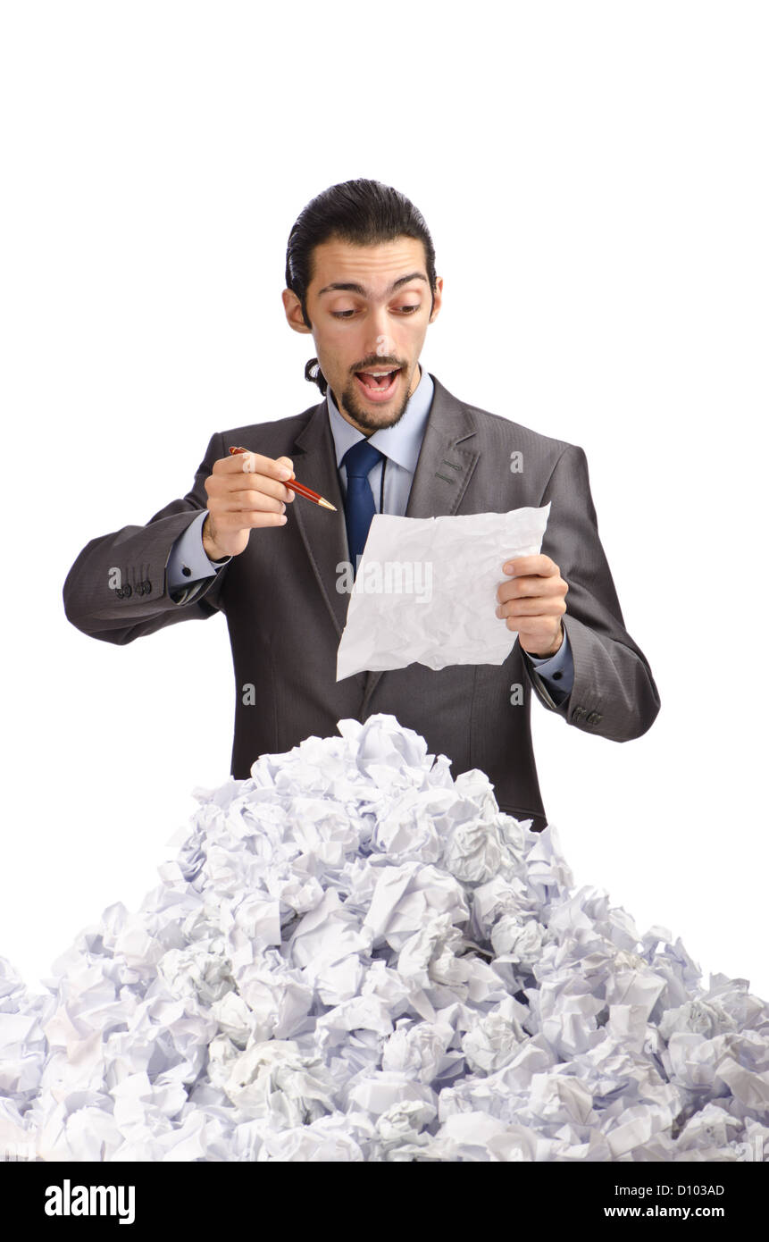 Man with lots of waste paper Stock Photo - Alamy