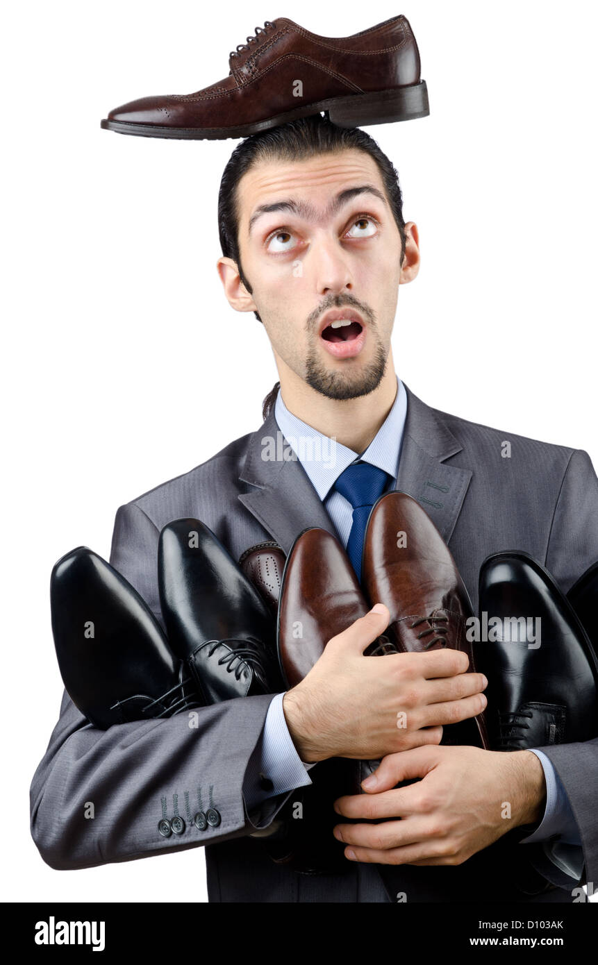 Man with a selection of shoes Stock Photo - Alamy