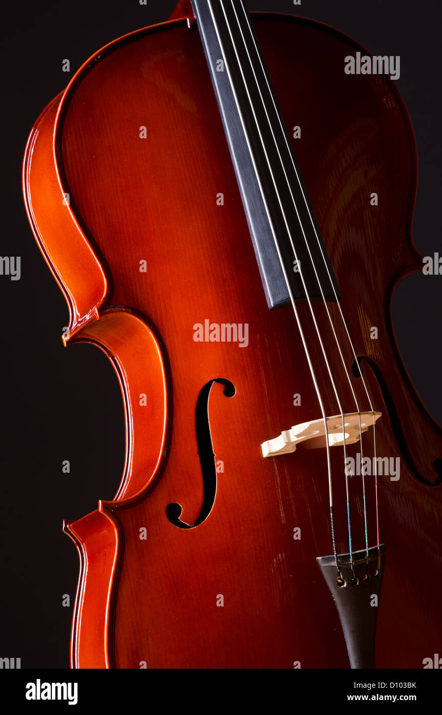 Music Cello in the dark room Stock Photo - Alamy