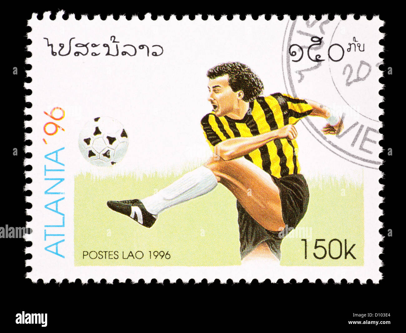 Postage stamp from Laos depicting depicting a soccer player kicking a ...