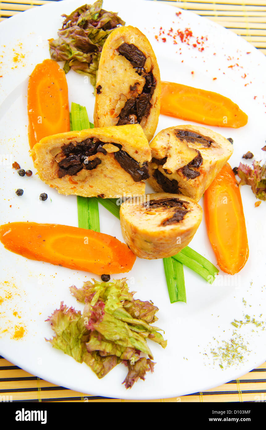 Meat and vegetable roll in plate Stock Photo - Alamy