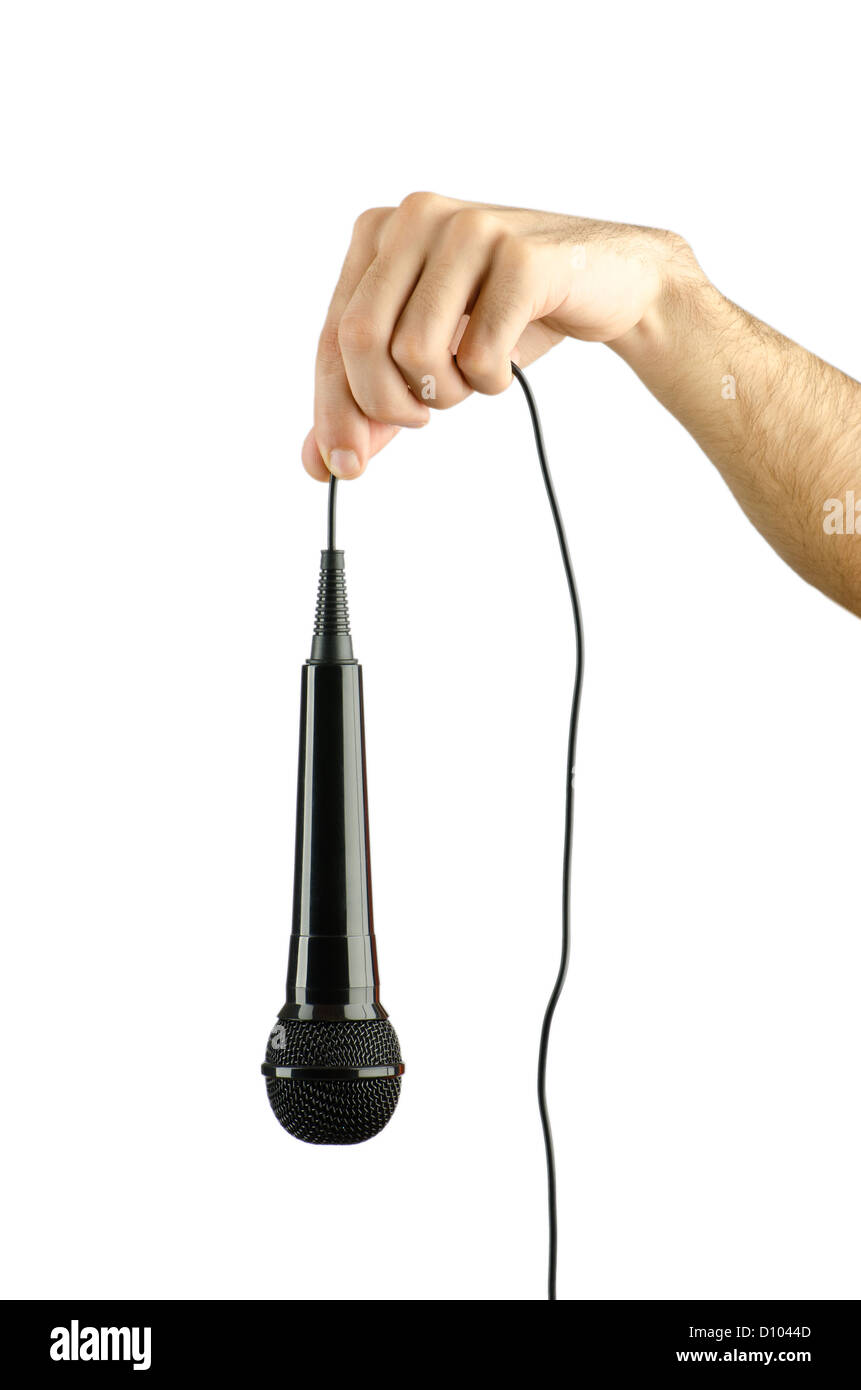 Hand holding microphone on white Stock Photo - Alamy