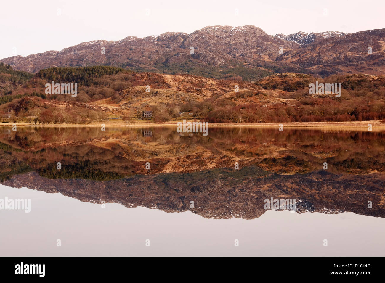 Perfect reflection of the shoreline at Llynnau Mymbyr, near Capel Curig ...