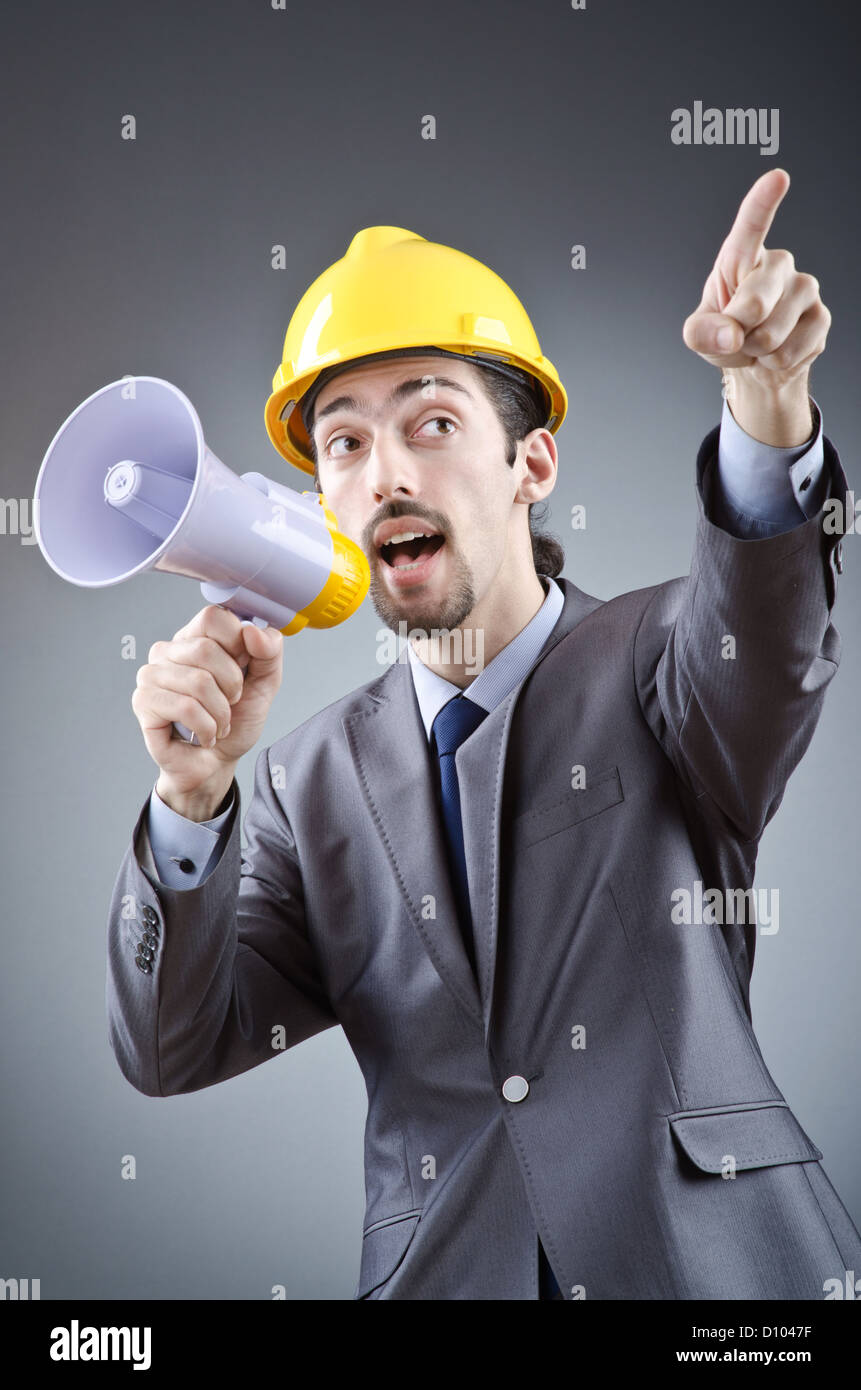 Man shouting and yelling with loudspeaker Stock Photo - Alamy