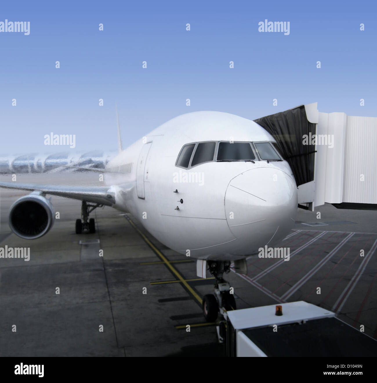 white plane parked in airport Stock Photo - Alamy