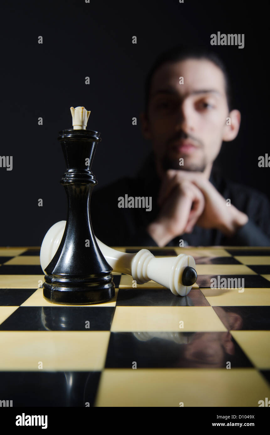 Chess player playing his game Stock Photo - Alamy