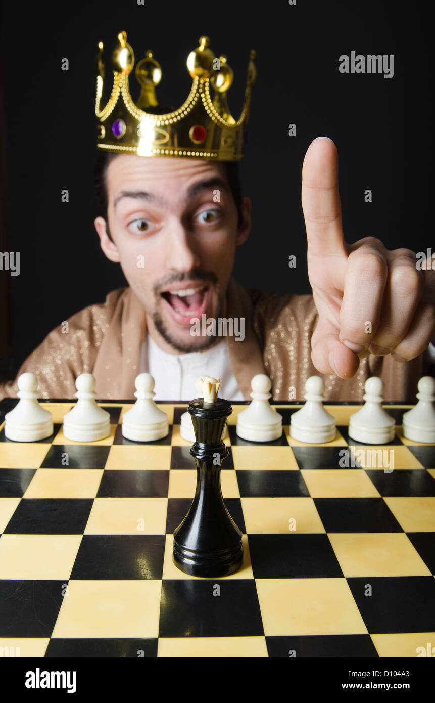 Chess player playing his game Stock Photo - Alamy