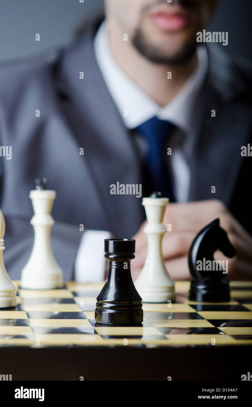Chess player playing his game Stock Photo - Alamy