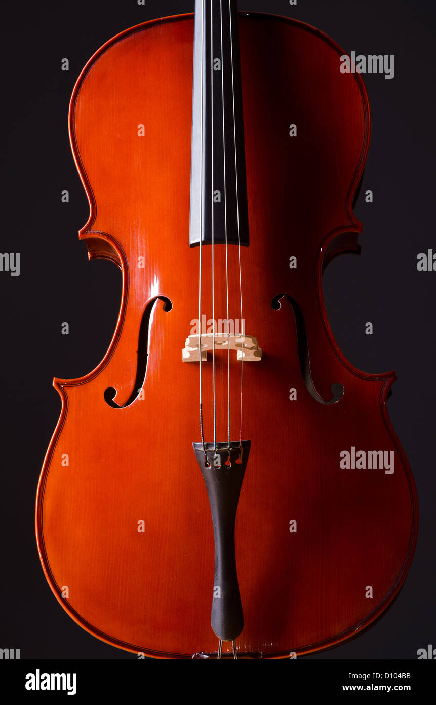 Music Cello in the dark room Stock Photo - Alamy