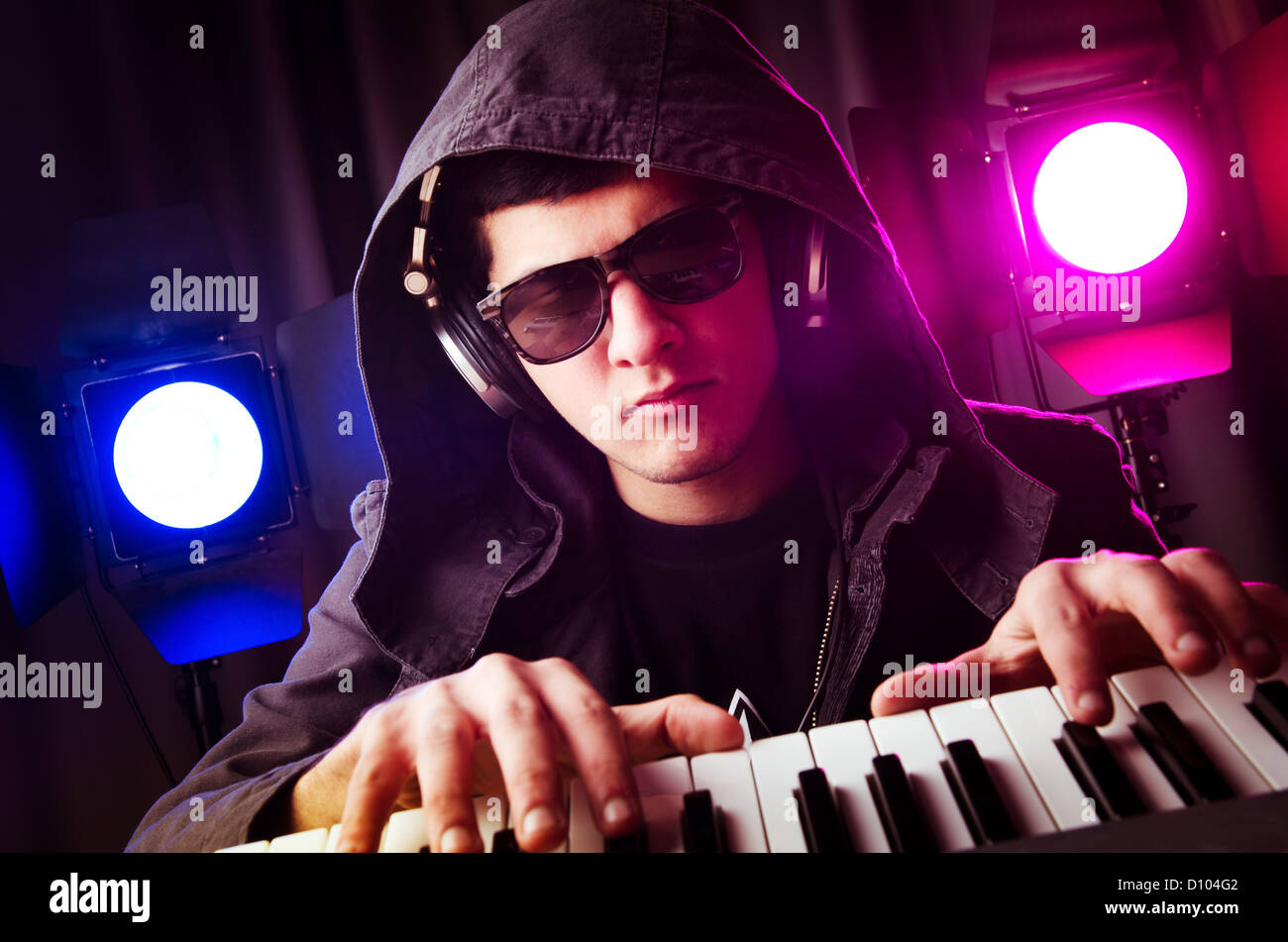 DJ mixing music at disco Stock Photo - Alamy