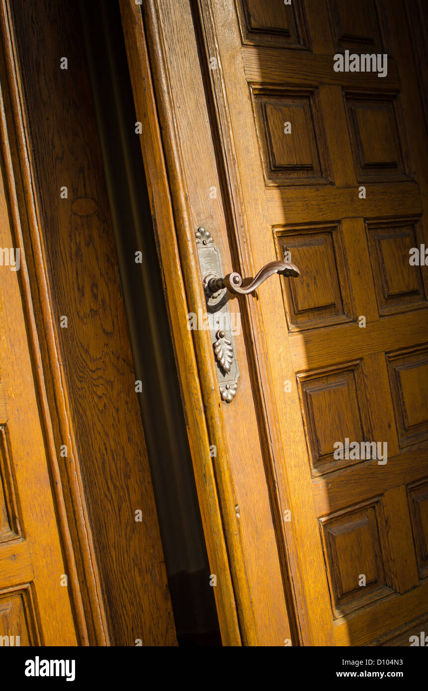 Heavy open wooden door hi-res stock photography and images - Alamy