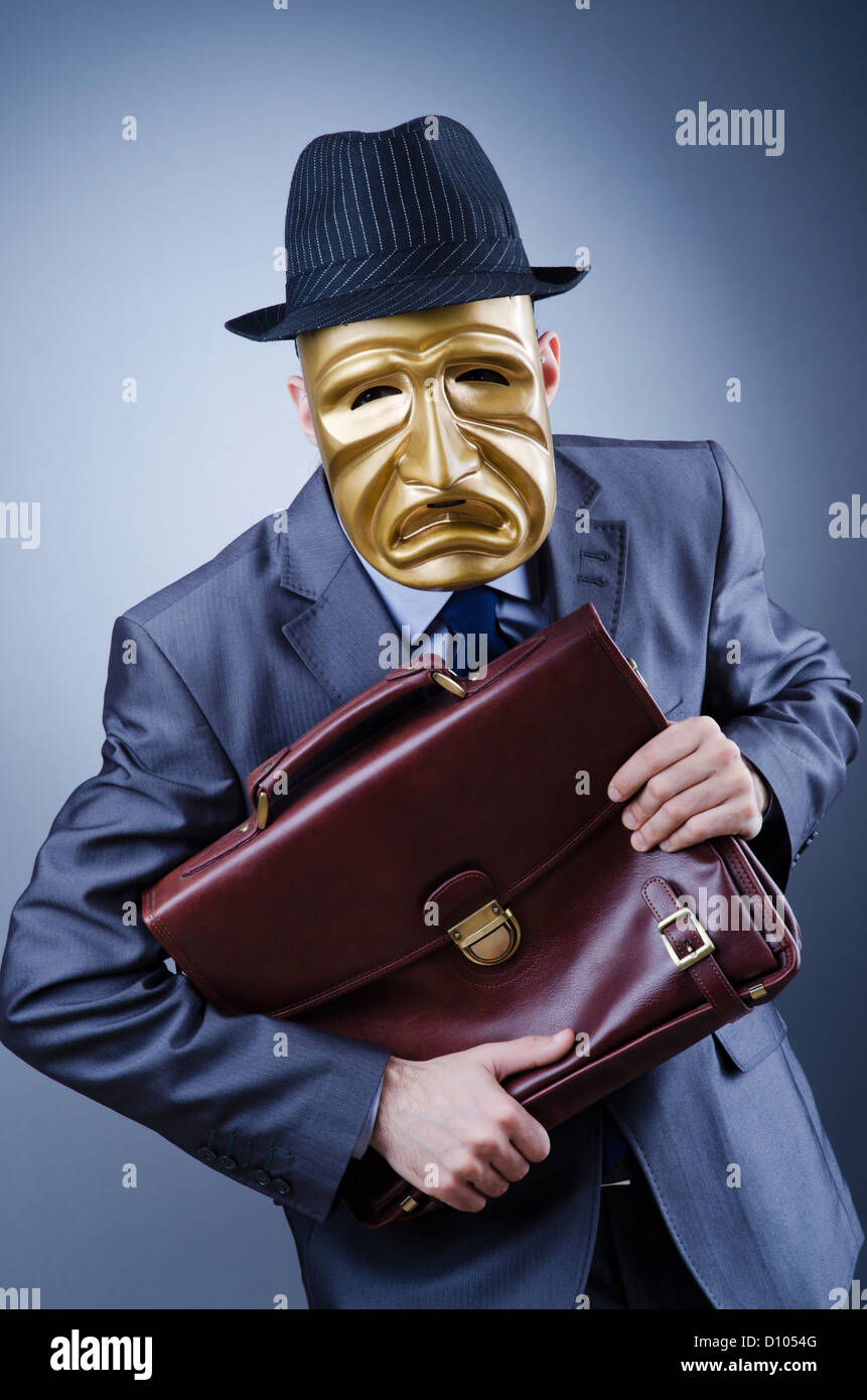 Businessman with mask concealing his identity Stock Photo - Alamy