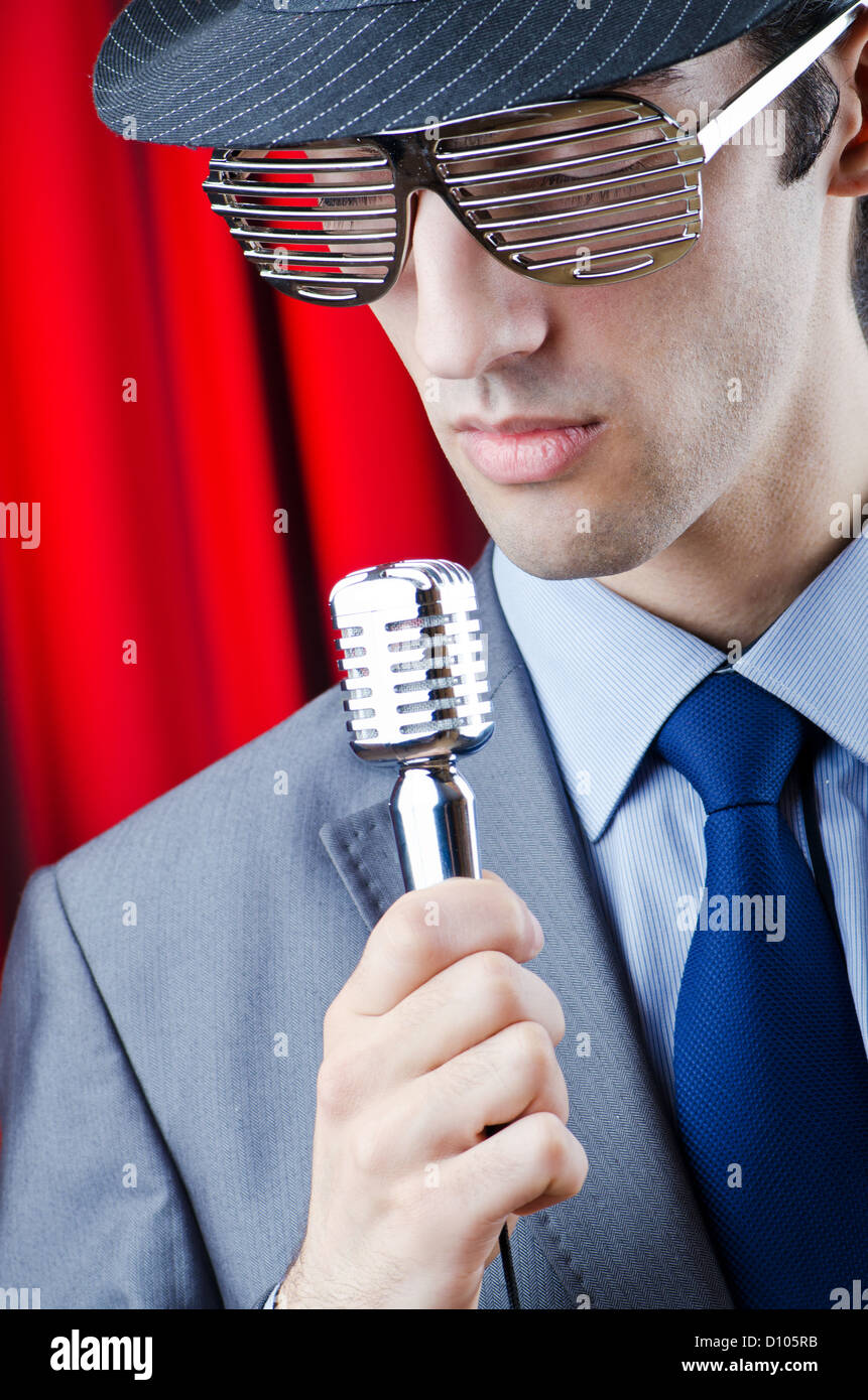 Man performing at the concert Stock Photo - Alamy