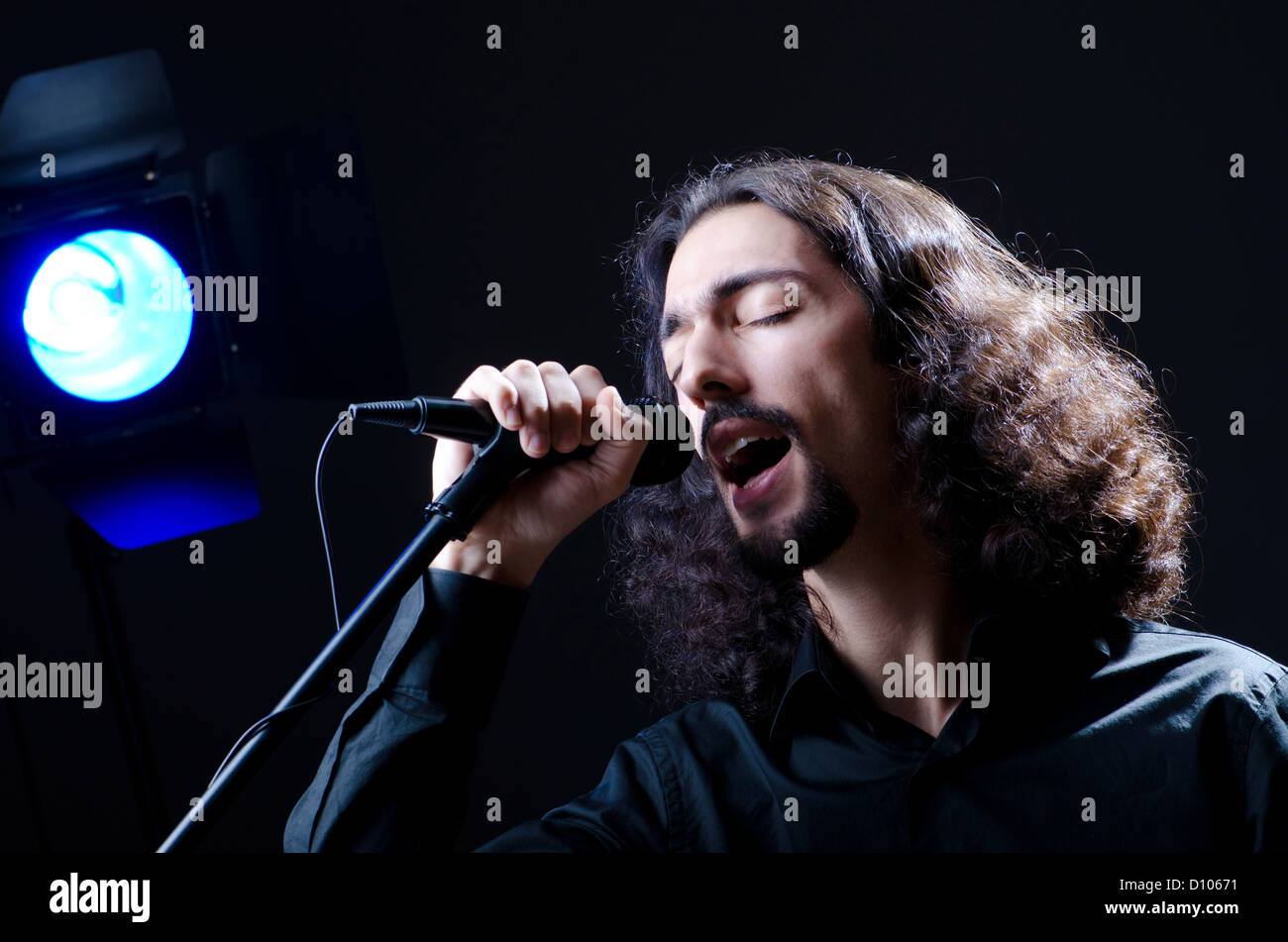 Man singing at the concert Stock Photo - Alamy