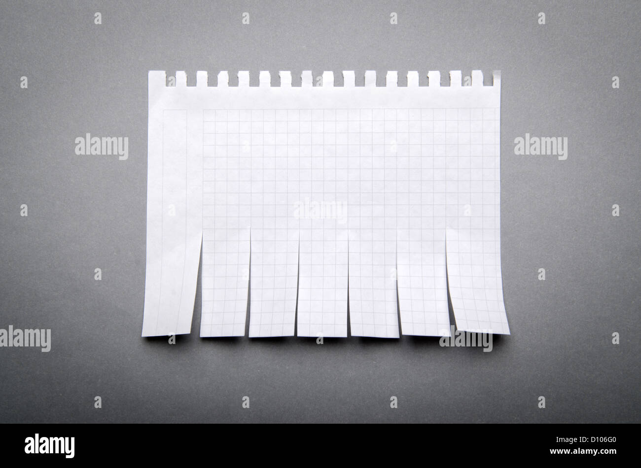 Tear off paper notice on the wall Stock Photo - Alamy