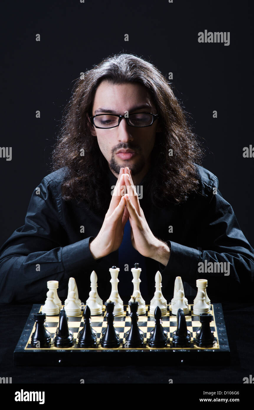 Chess player playing his game Stock Photo - Alamy