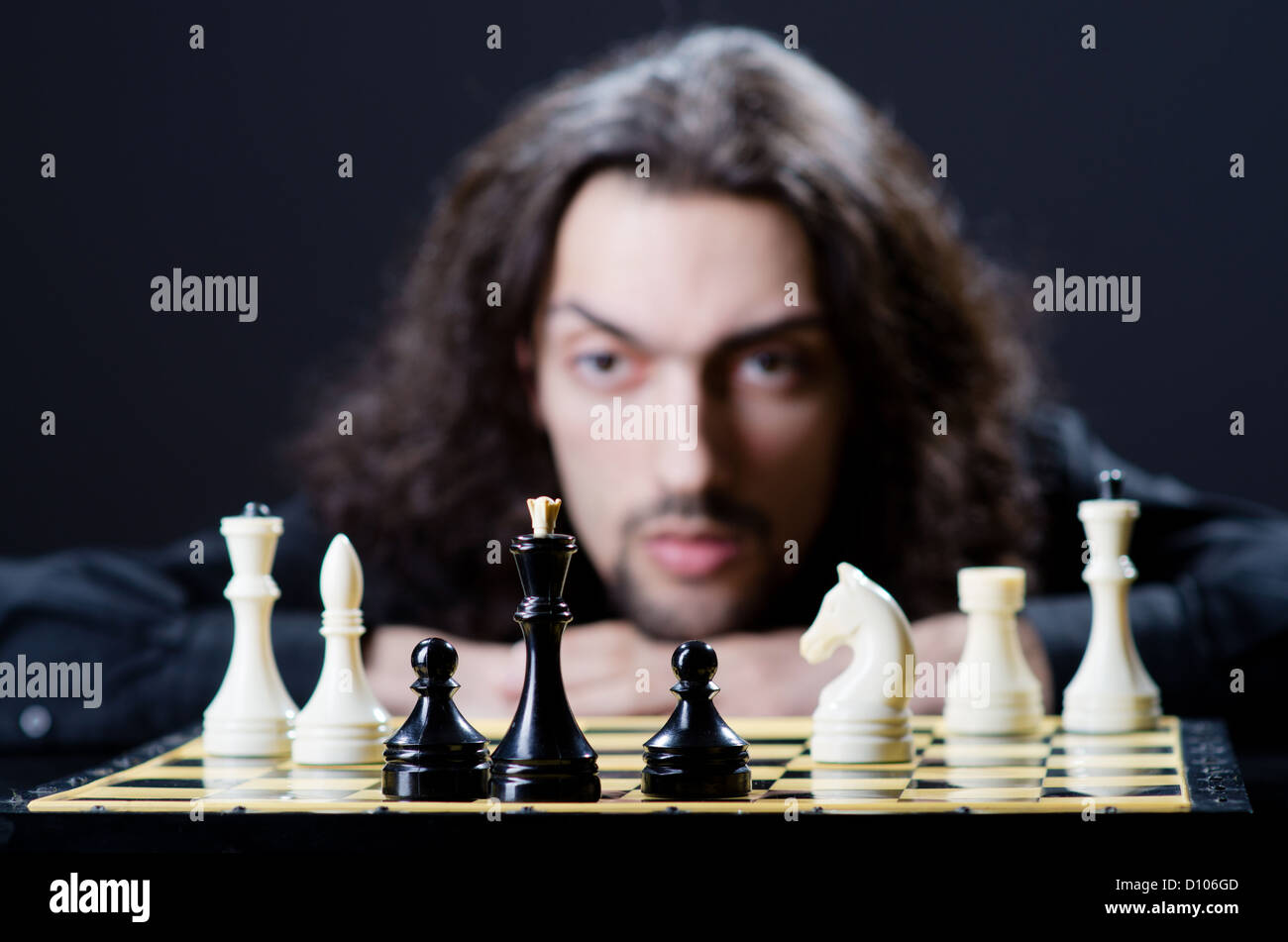 Chess player playing his game Stock Photo - Alamy