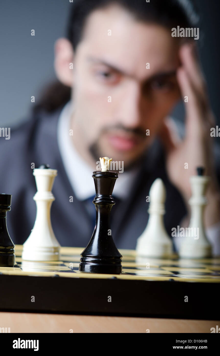 Chess player playing his game Stock Photo - Alamy