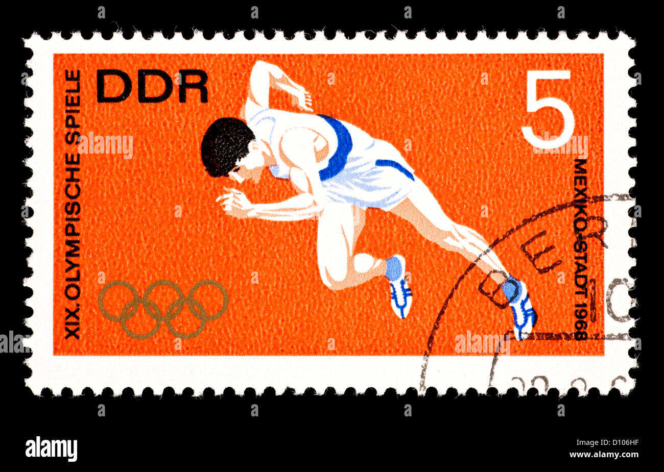 Postage stamp from East Germany (DDR) depicting a sprinter at the start ...