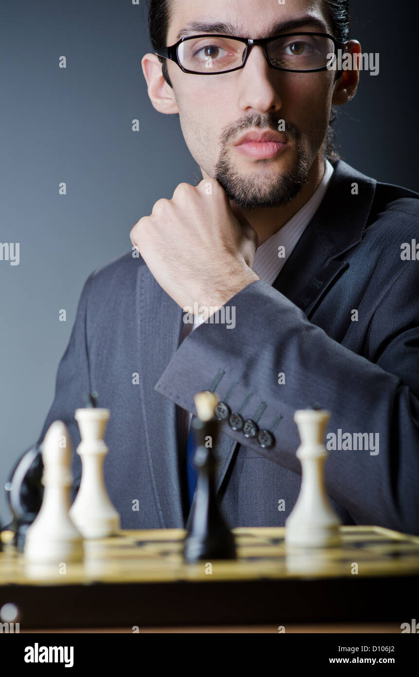 Chess player playing his game Stock Photo - Alamy