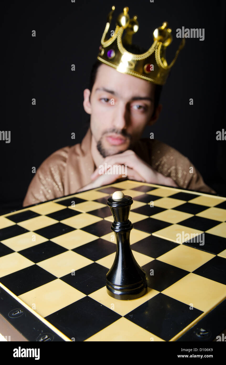 Chess player playing his game Stock Photo - Alamy