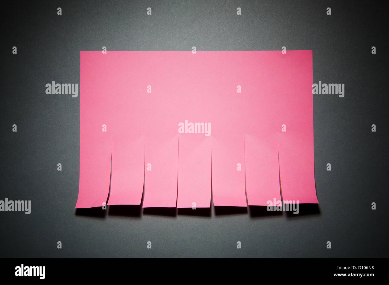 Tear off paper notice on the wall Stock Photo - Alamy