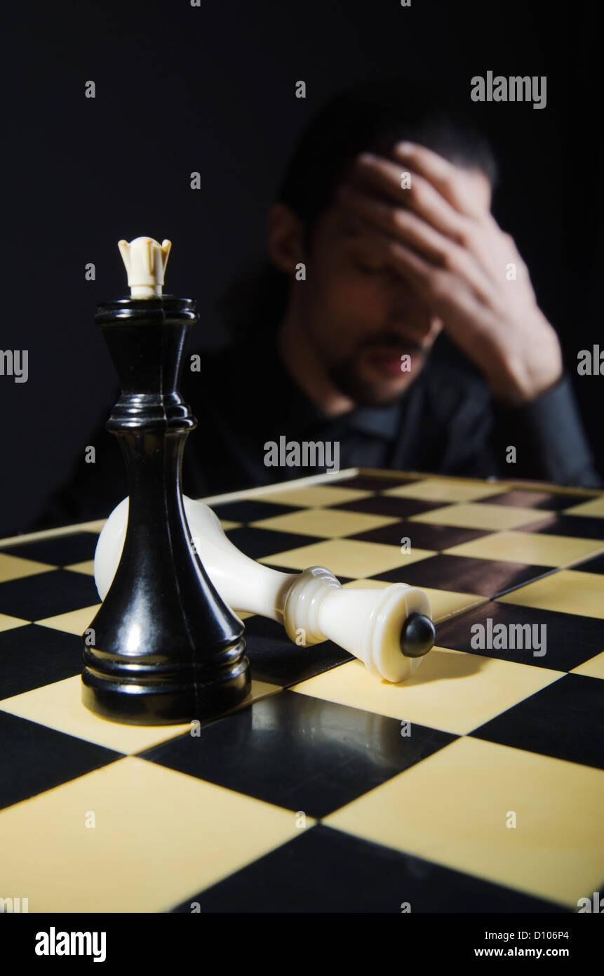 Chess player playing his game Stock Photo - Alamy