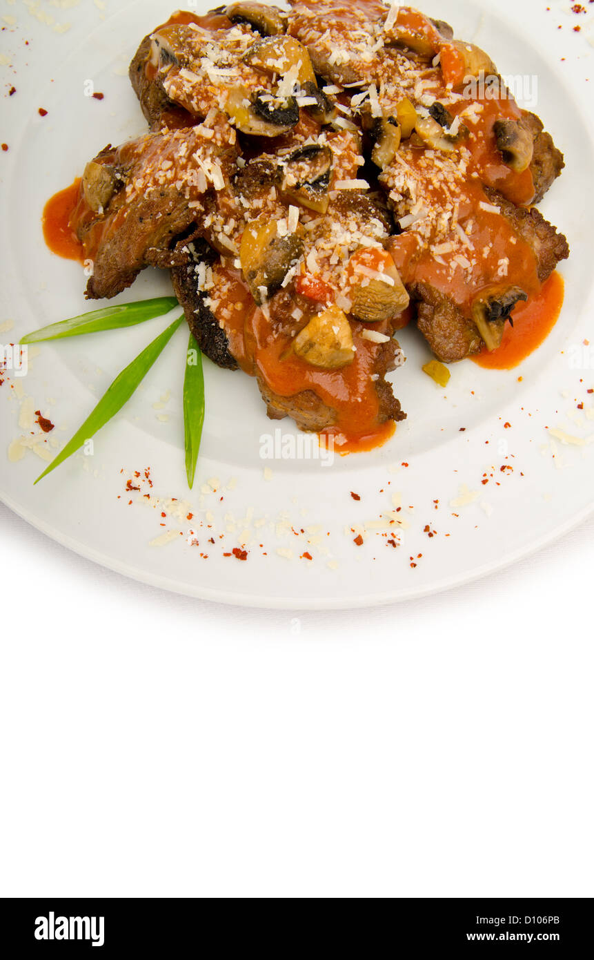 Meat piecies served in the plate Stock Photo - Alamy