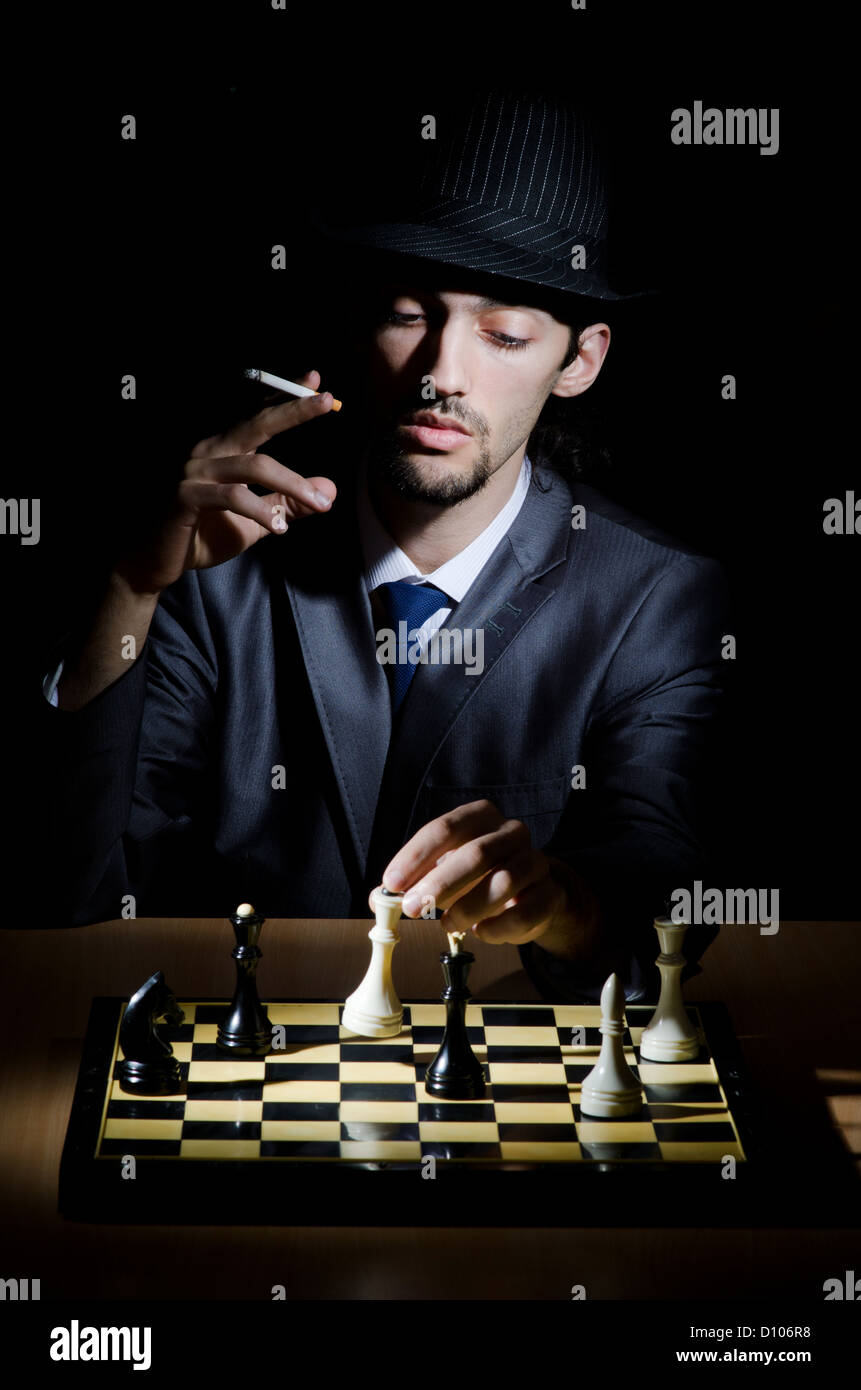 Chess player playing his game Stock Photo - Alamy