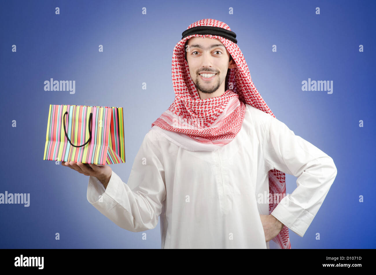 Hand giving christmas gift bags hi-res stock photography and images - Alamy