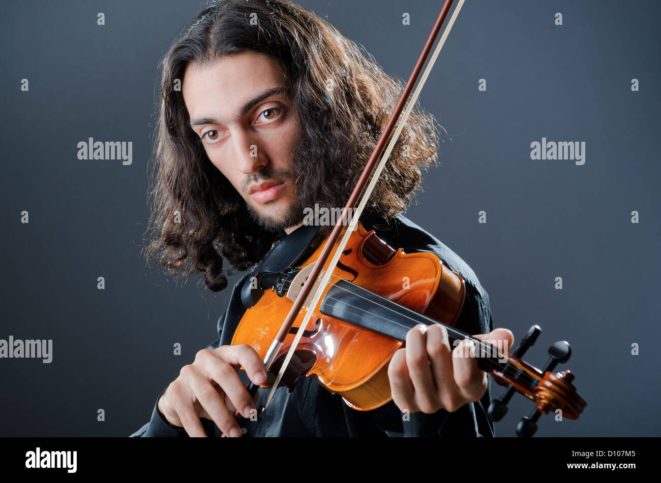 Violin player playing the intstrument Stock Photo - Alamy