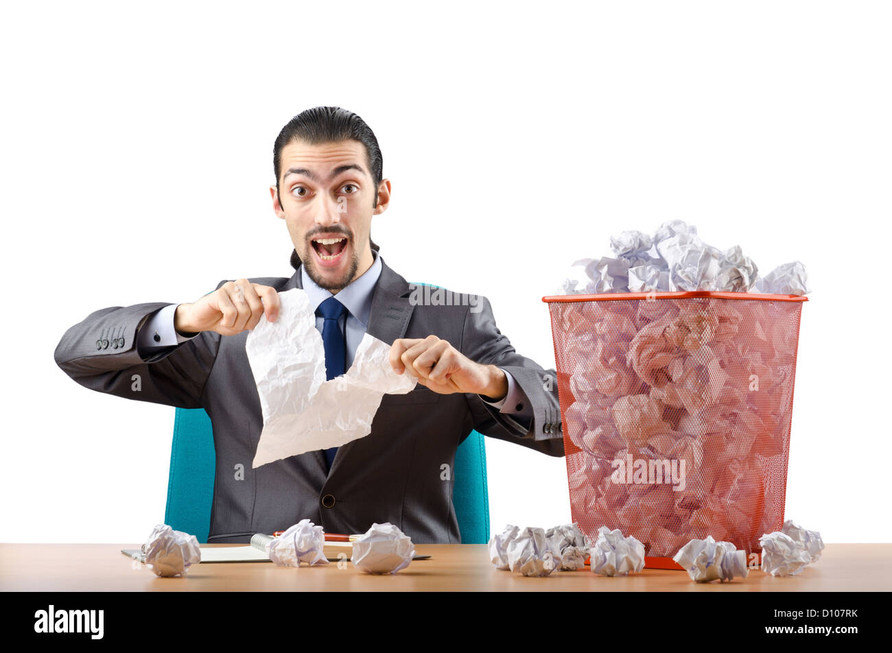 Man with lots of wasted paper Stock Photo - Alamy