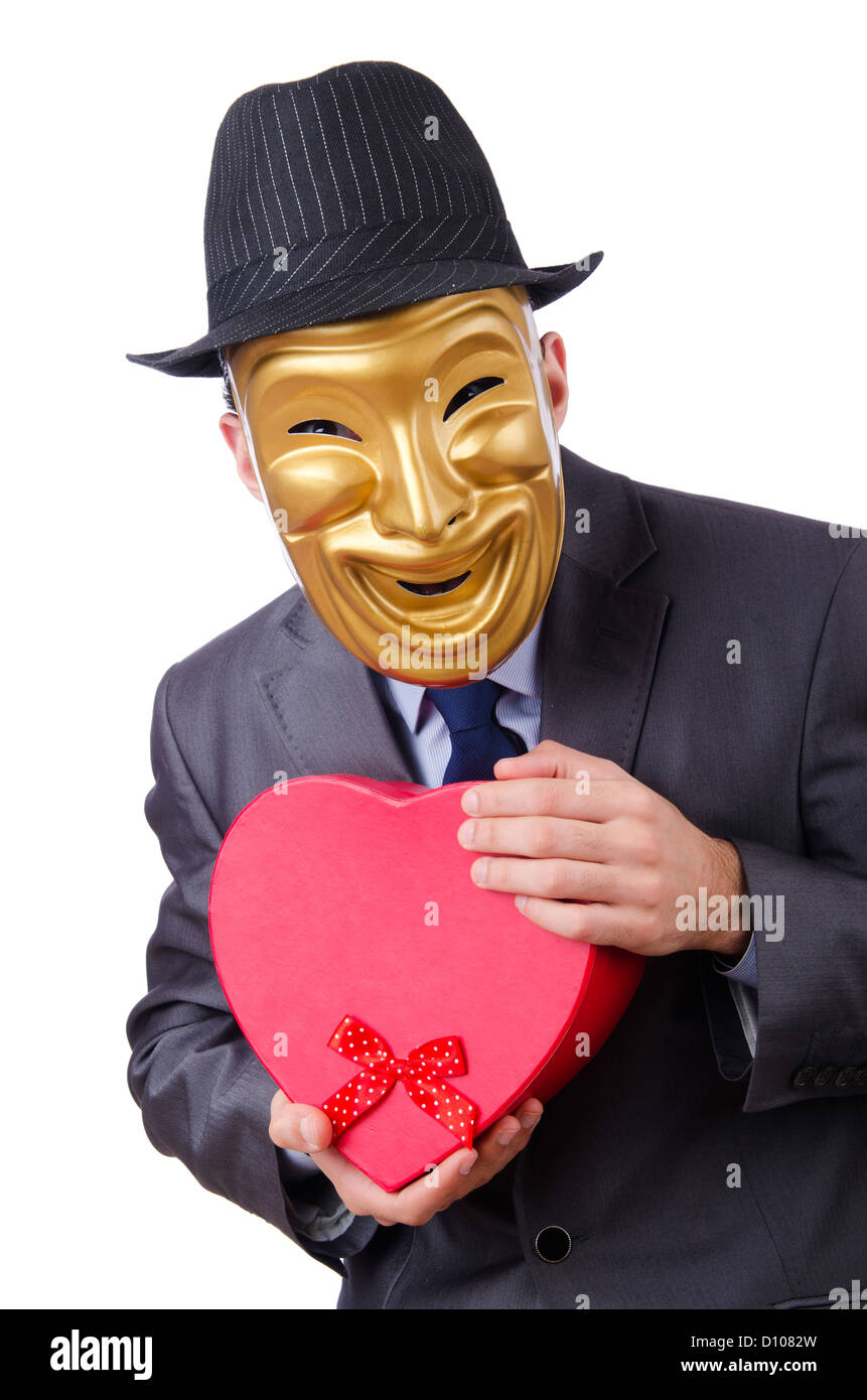 Masked man with giftbox on white Stock Photo - Alamy