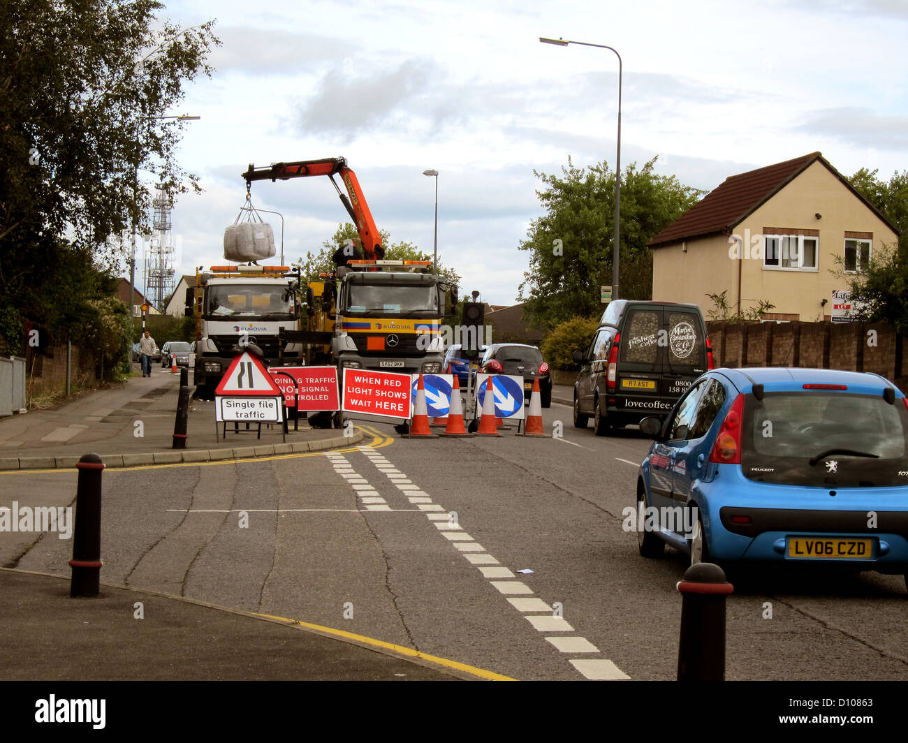 Highway works with trucks transferring loads Stock Photo - Alamy